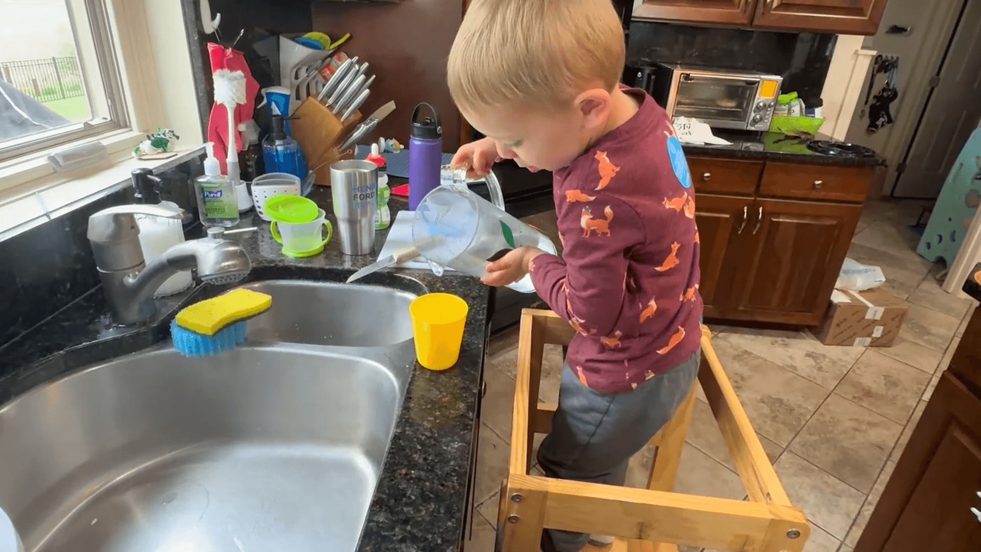 Pathways.org | Pours liquid from large pitcher to cup